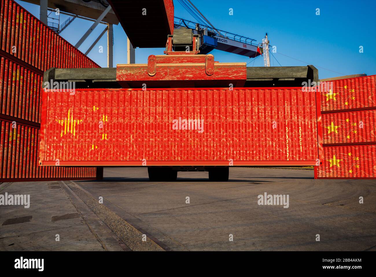 Unloading containers with the Chinese flag at the port quay Stock Photo ...