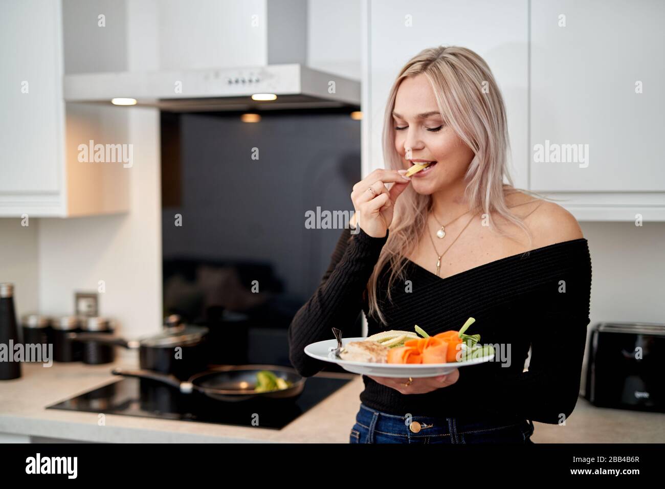 single female healthy eating Stock Photo - Alamy