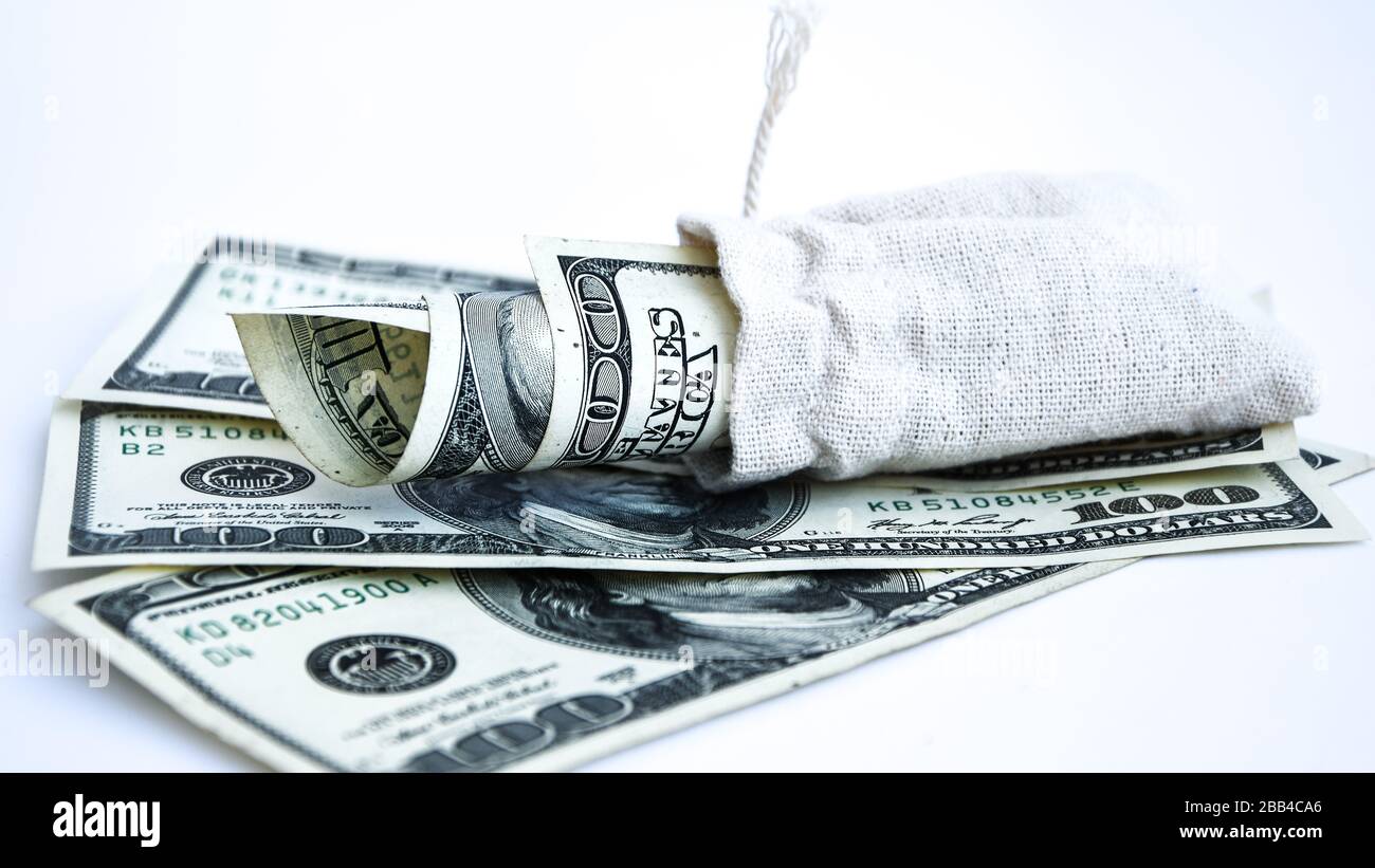 Dollar bills in a sack hi-res stock photography and images - Alamy