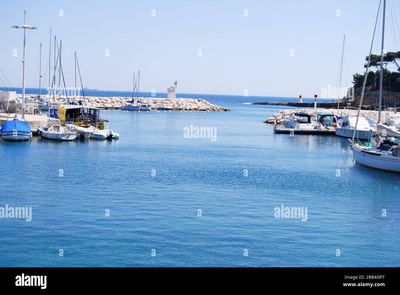 Pretty harbor with boats and view on the sea side and the city in ...