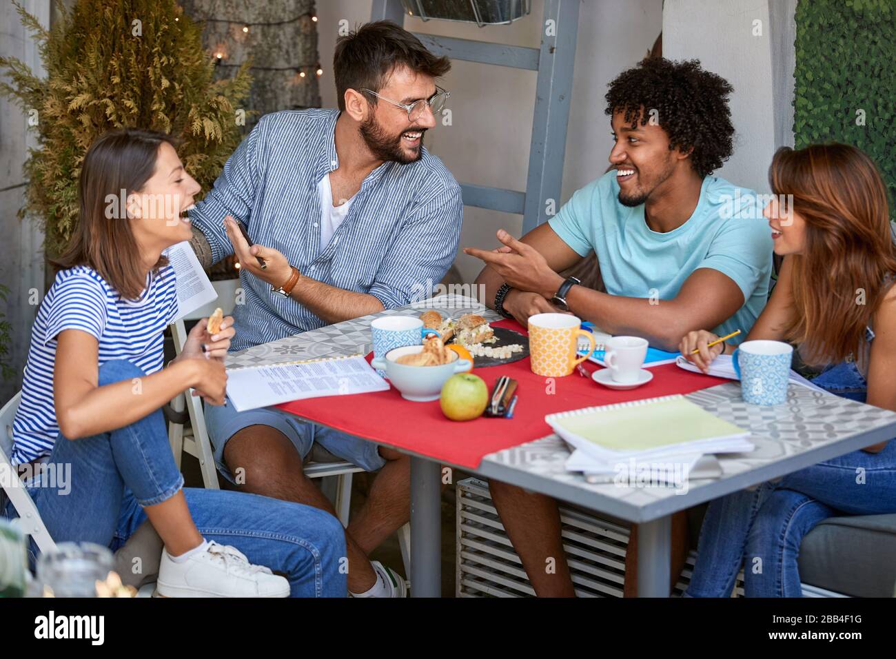 Young people learning together and having fun Stock Photo - Alamy