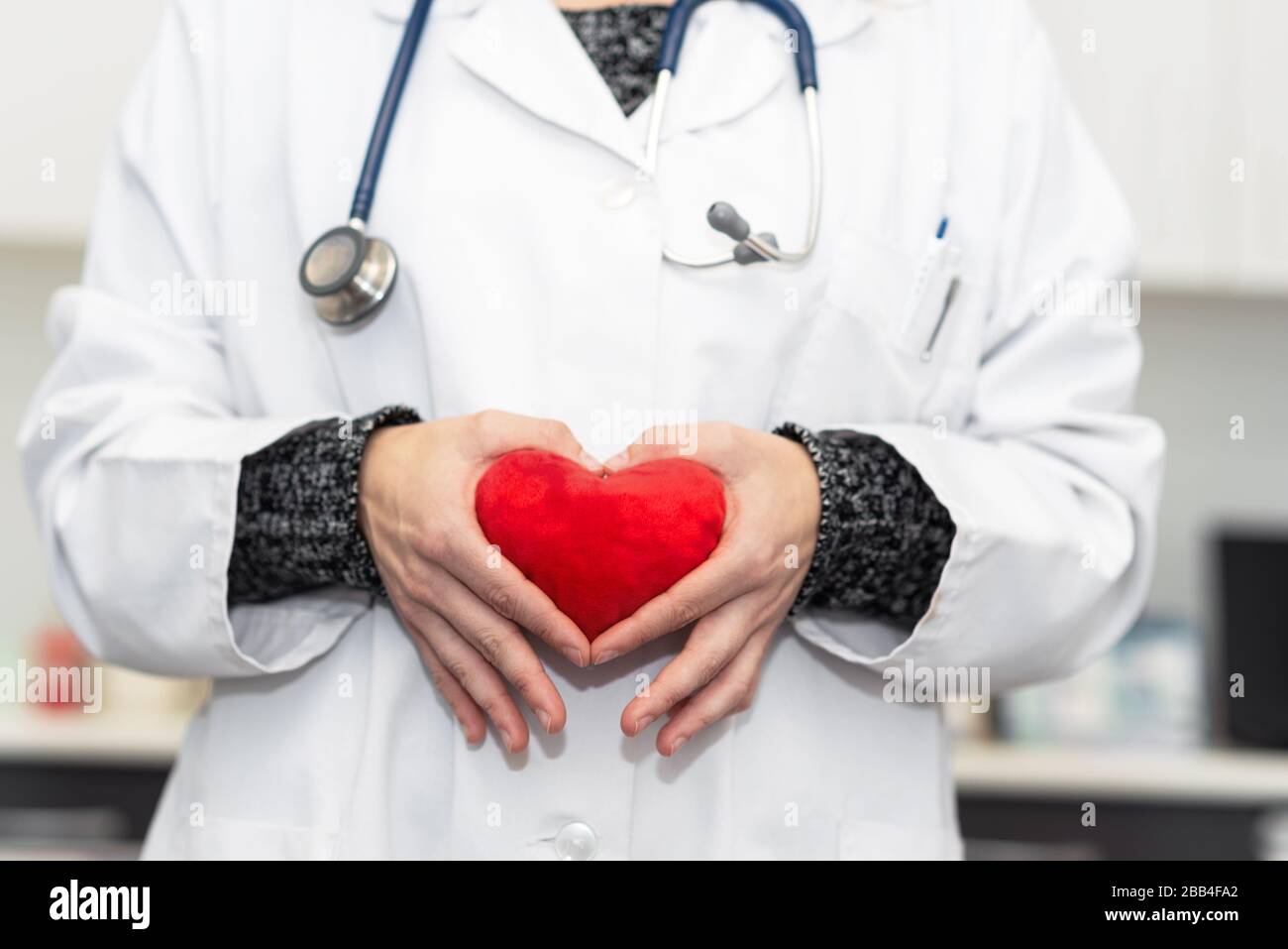 Red stethoscope in doctors hi-res stock photography and images - Alamy