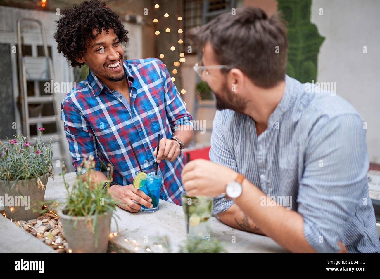 Guy socializing hi-res stock photography and images - Alamy