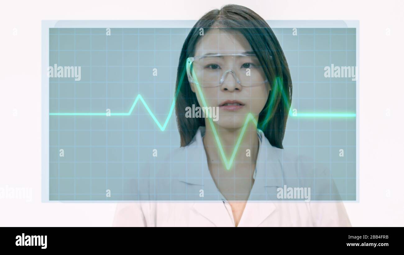 Female Asian doctor looking at virtual medical EKG screen Stock Photo ...