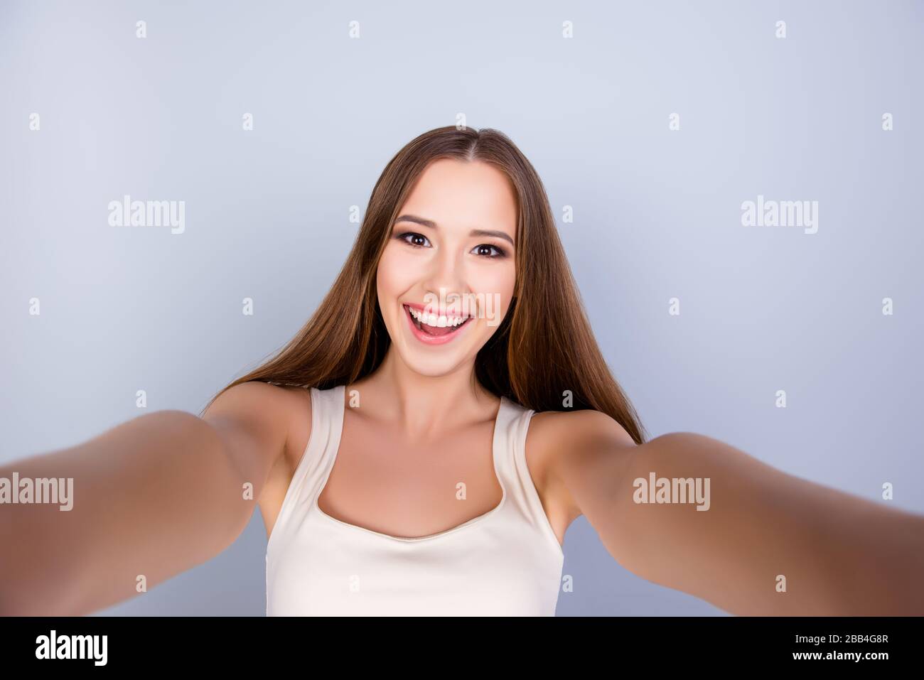 Girl wearing white singlet hi-res stock photography and images - Alamy