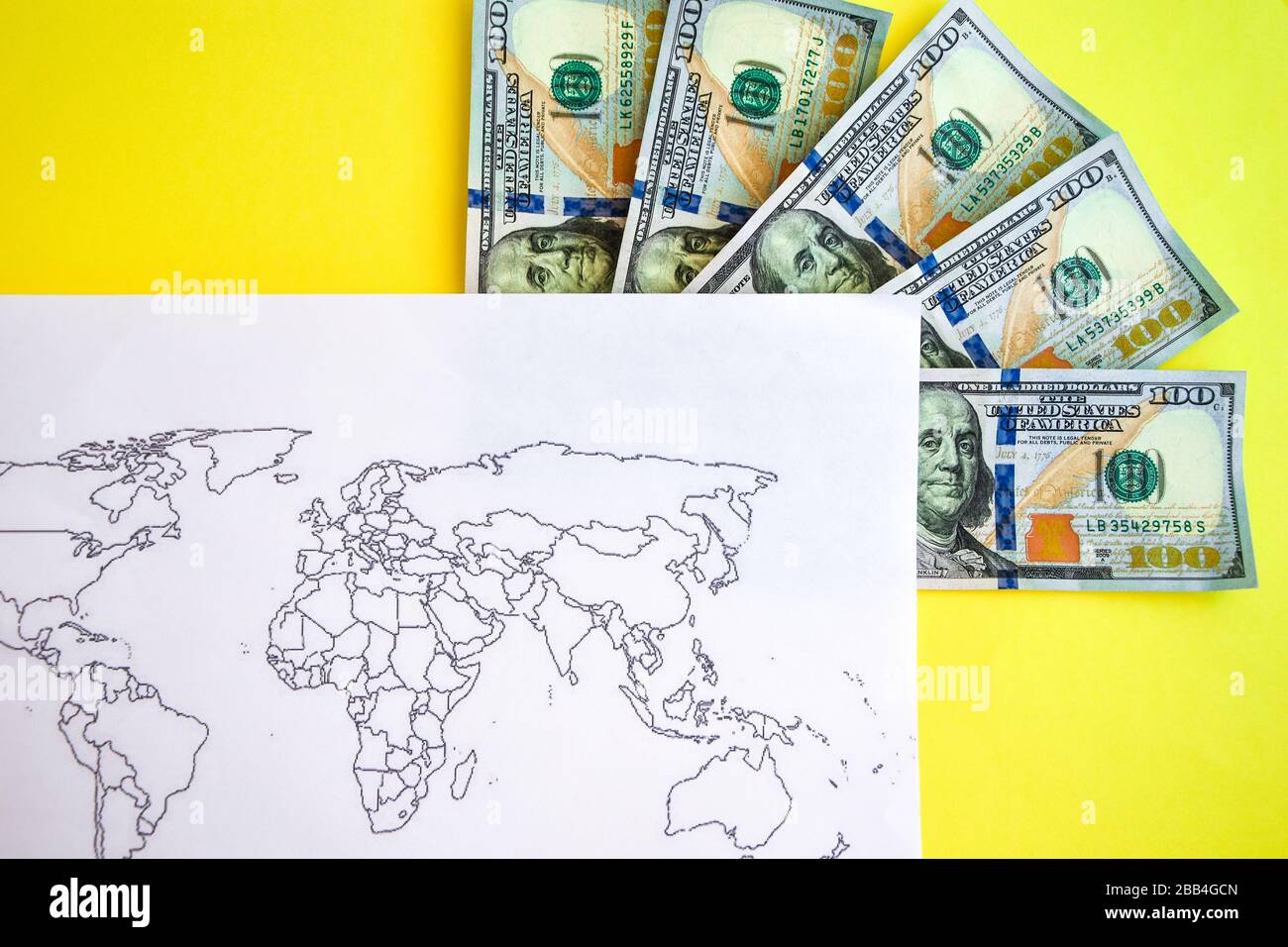Pile of dollars near USA on world map, money, dollar and world map view ...