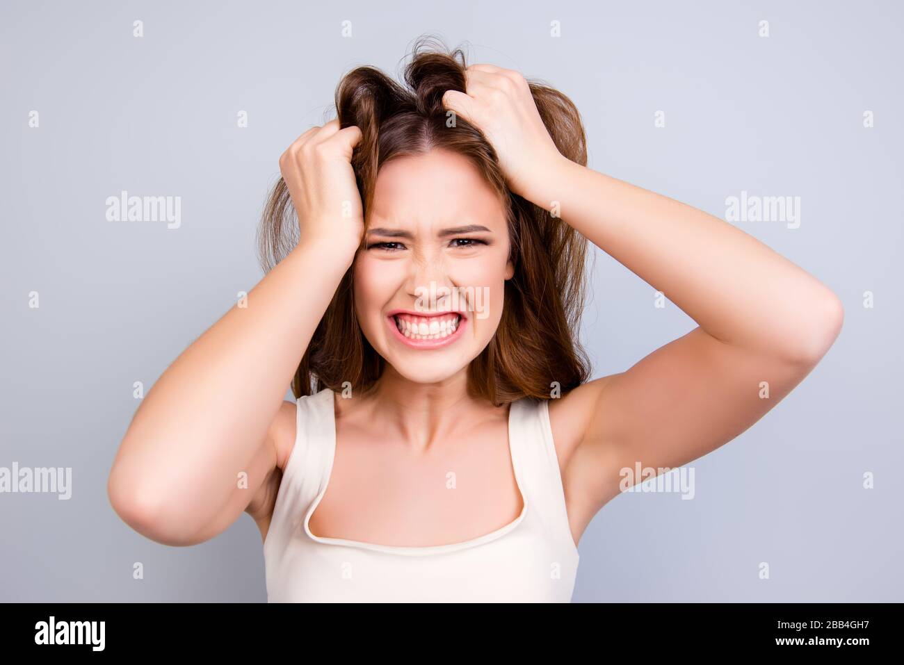 Going crazy and insane. Close up portrait of shouting stressed young ...