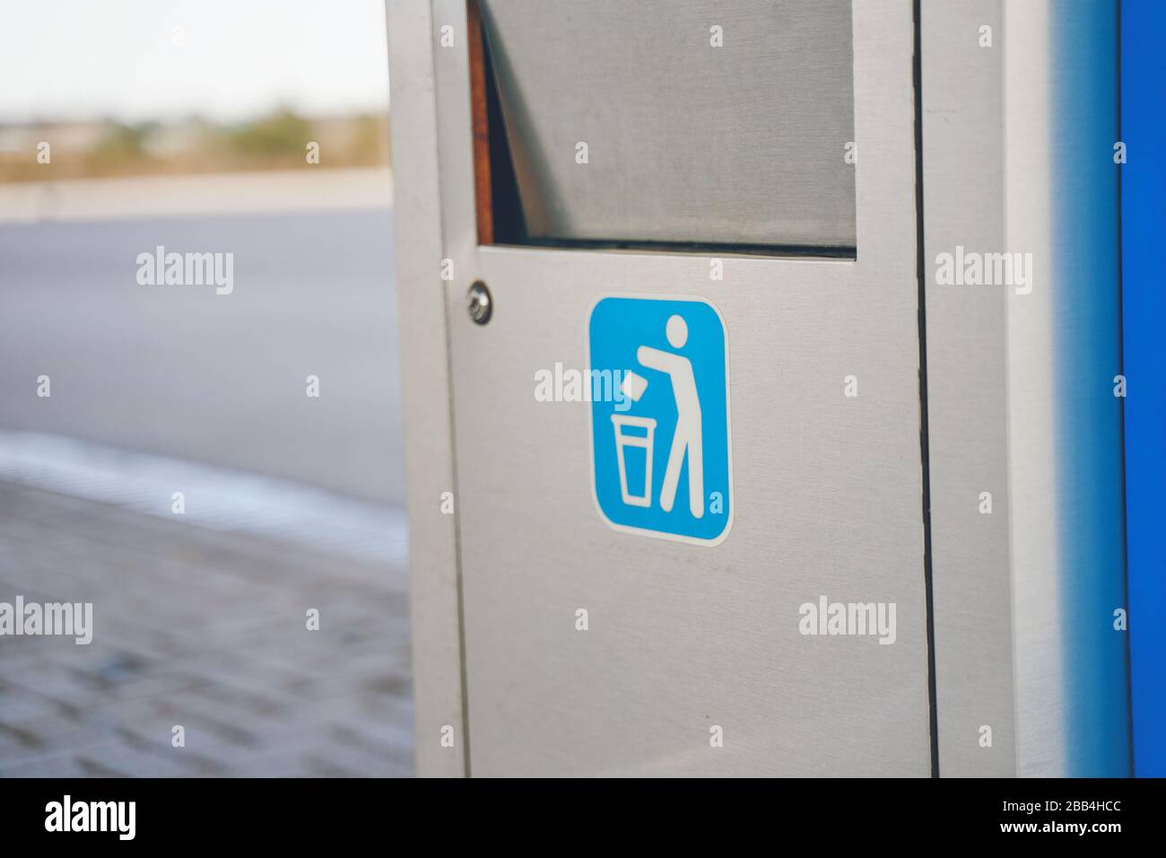 Trashcan logo on a modern garbage bin on the street Stock Photo - Alamy