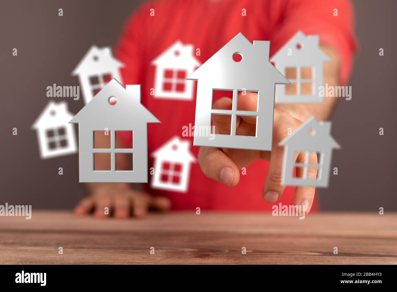house in among houses for real estate concept Stock Photo - Alamy