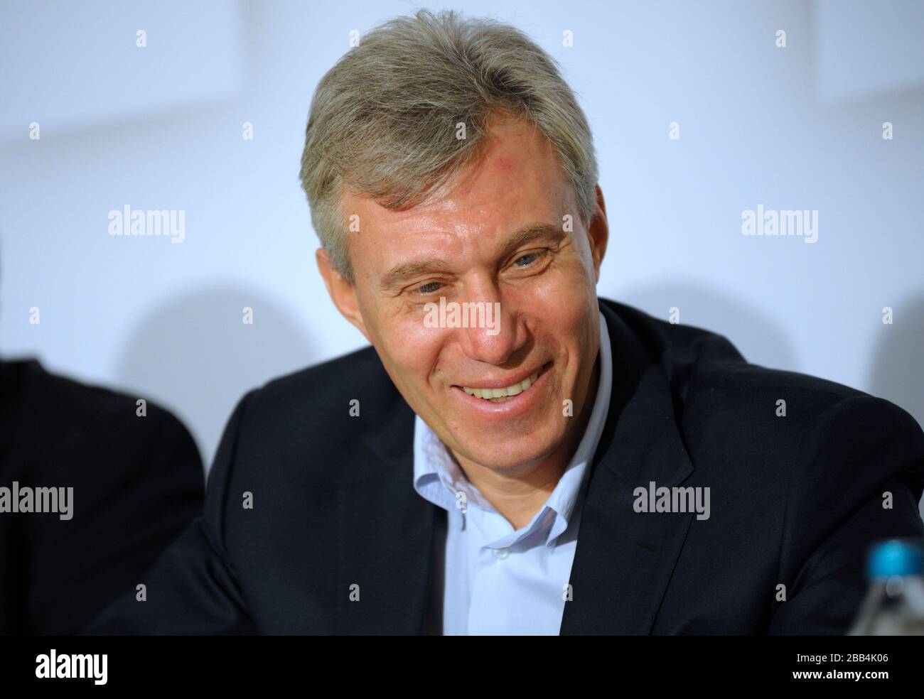 German Khan, Ukrainian-Russian entrepreneur, listening to the speakers ...