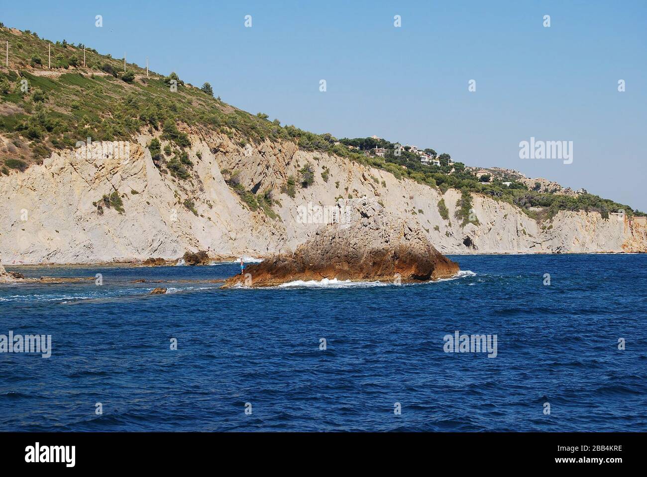 Beautiful view of the sea with a bridge and mountain rocks with trees ...