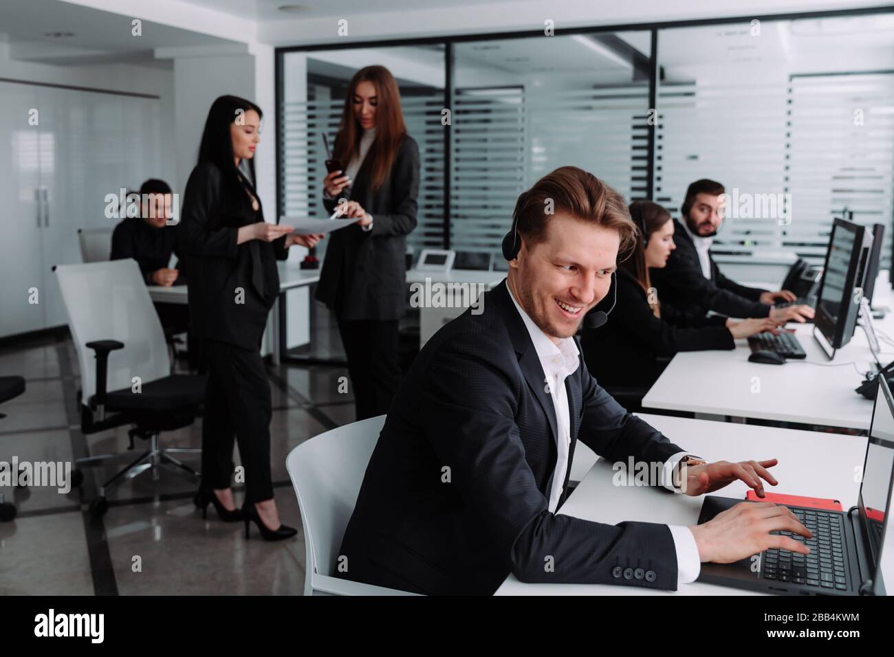 Cheerful smart call center agent hi-res stock photography and images ...