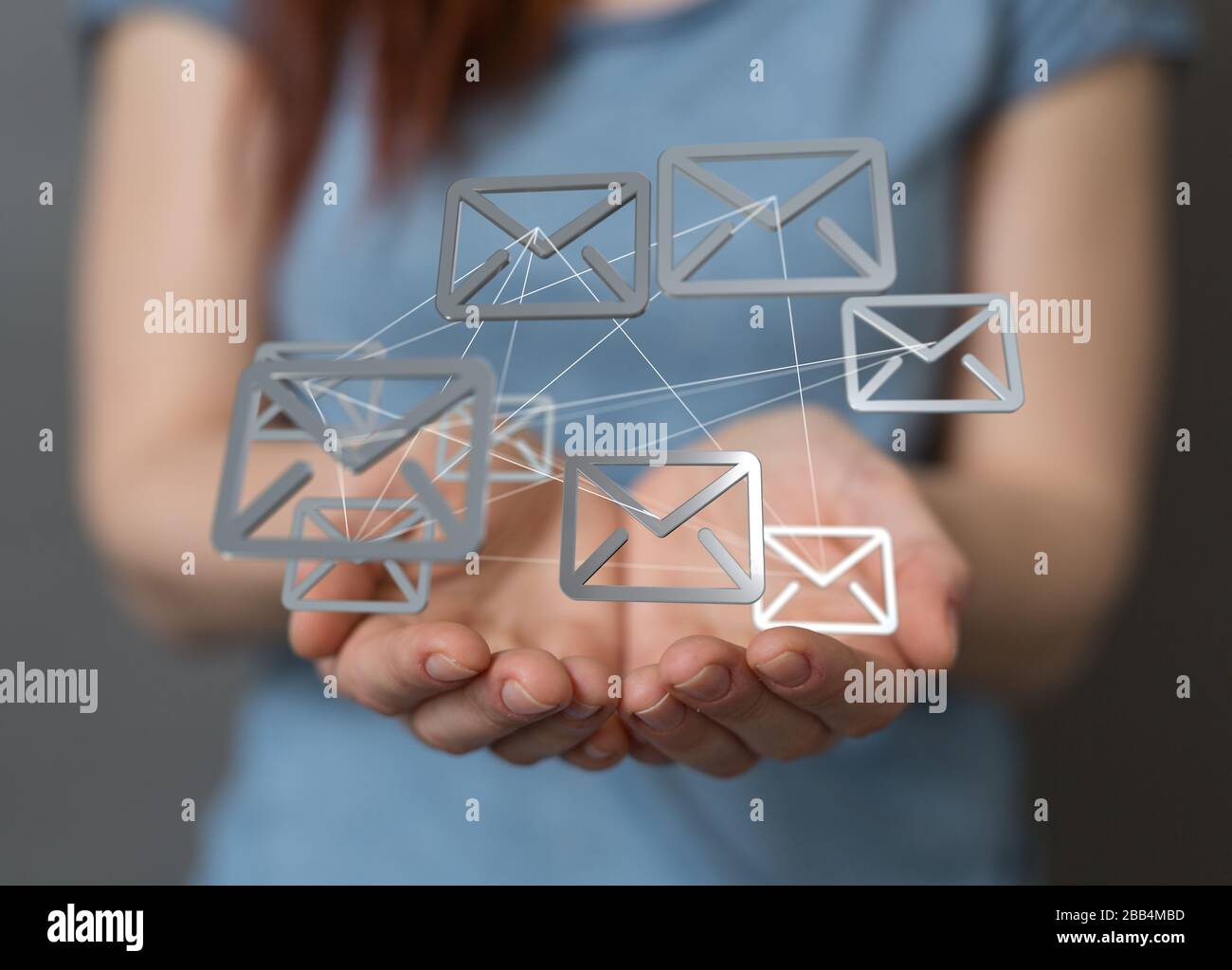 A Hand with an email icon 3d Stock Photo - Alamy