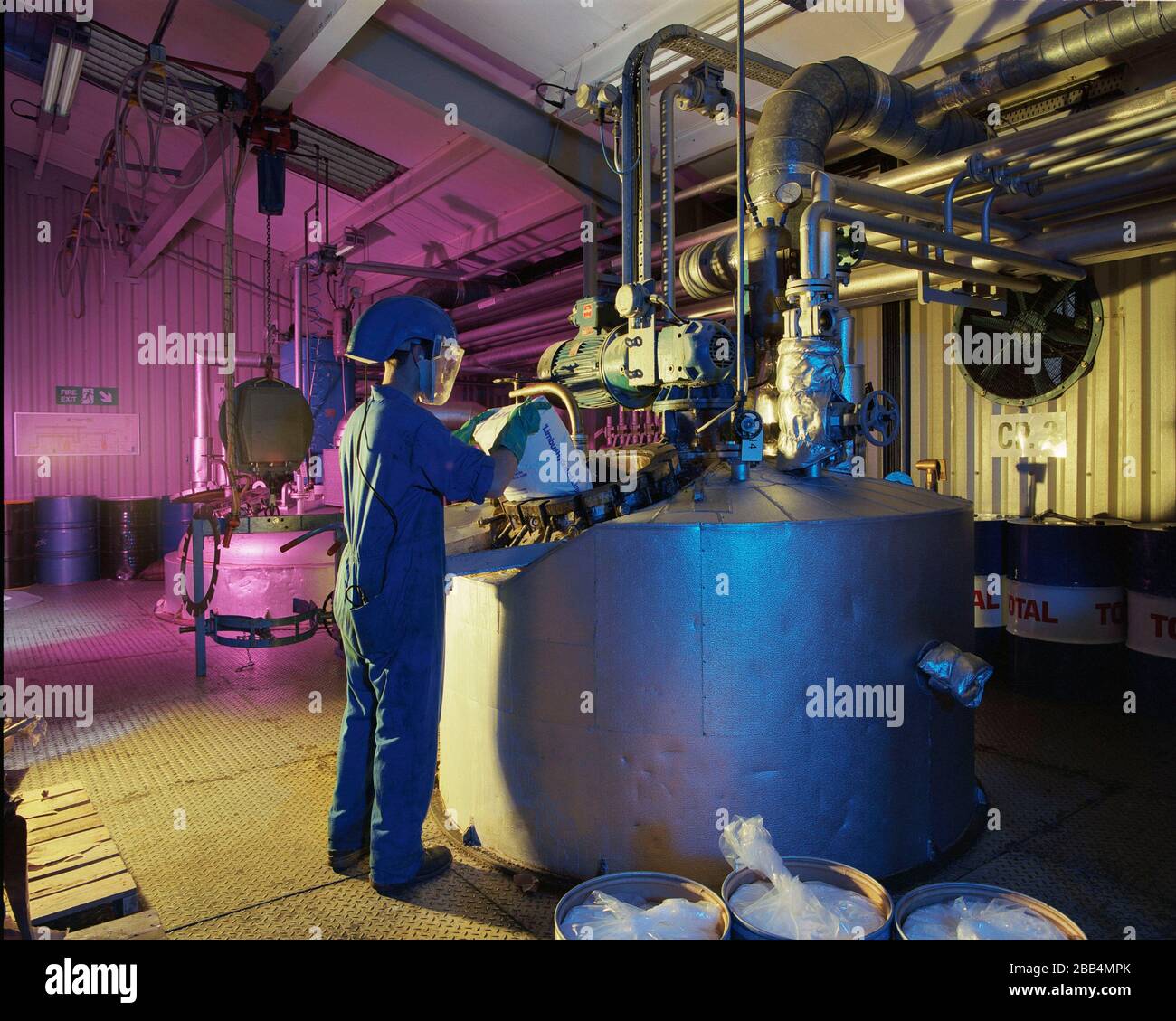 Workers in grease plant hi-res stock photography and images - Alamy