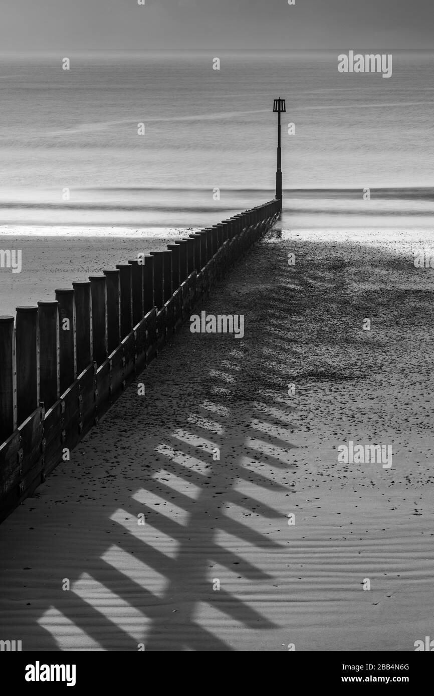 Timber groynes Black and White Stock Photos & Images - Alamy