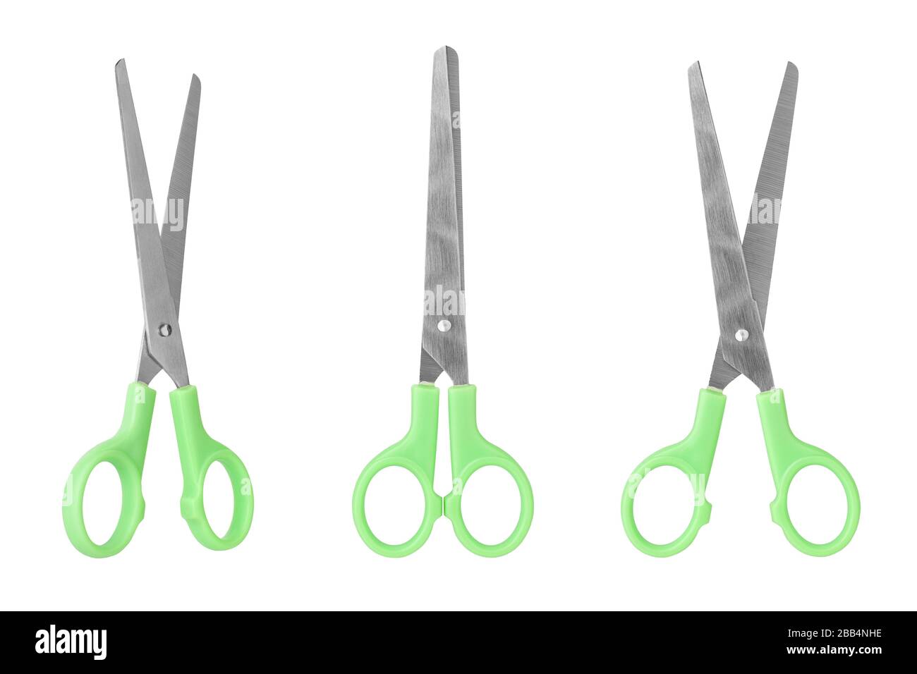 Silver metal open and closed scissors with green plastic handle white ...