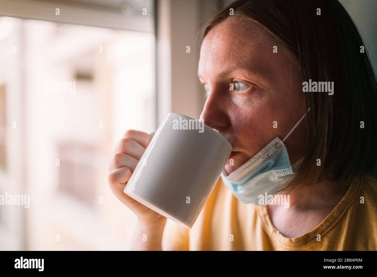 Drinking through window coronavirus hi-res stock photography and images ...