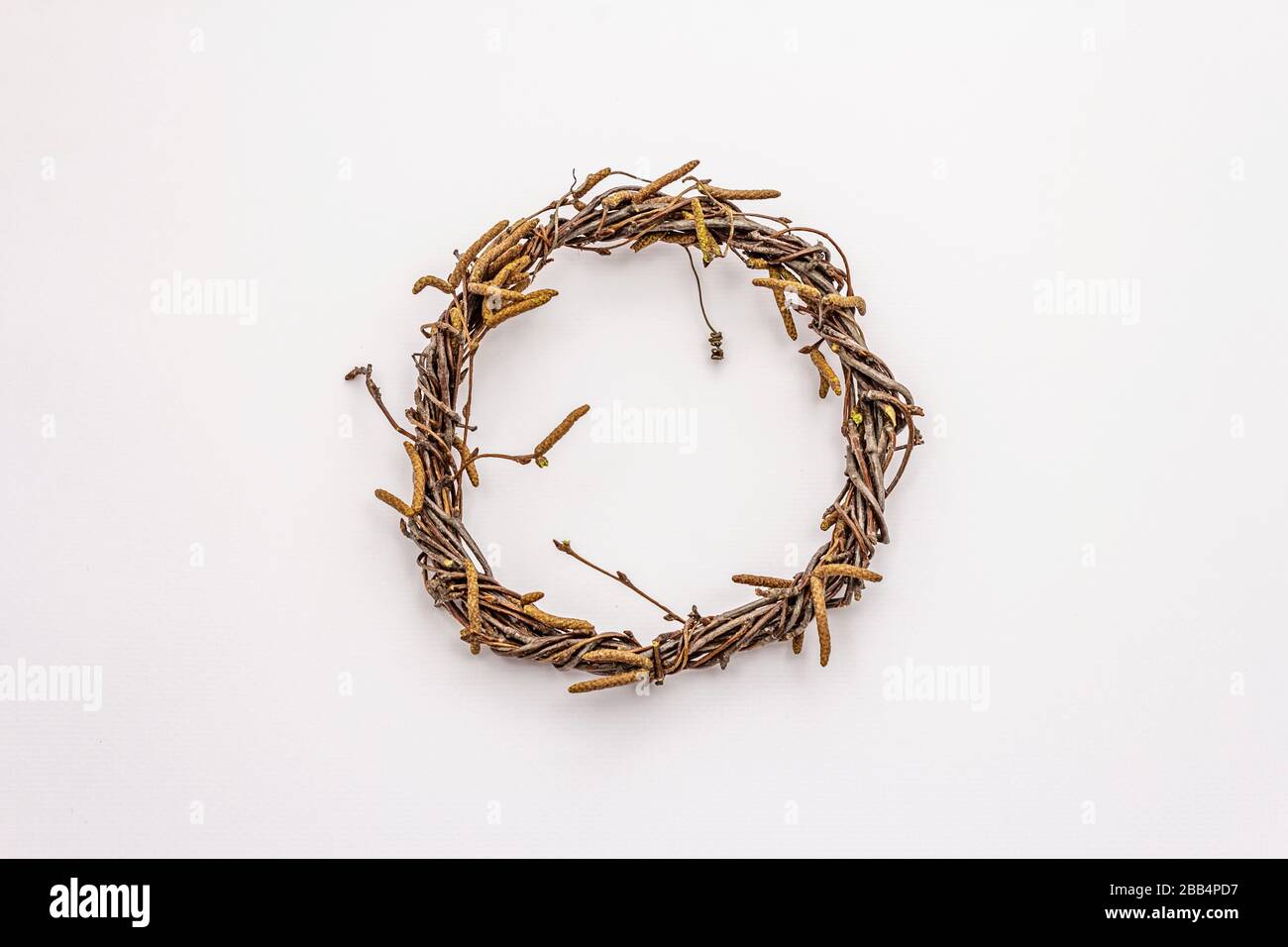 Wicker wreath of birch branches isolated on white background. Easter ...