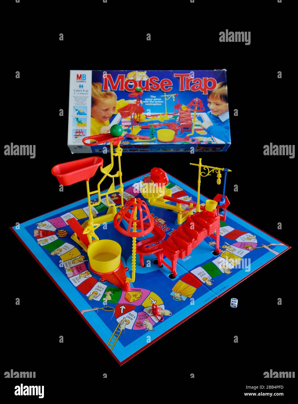 Mouse Trap Mousetrap board game and box against a black background ...