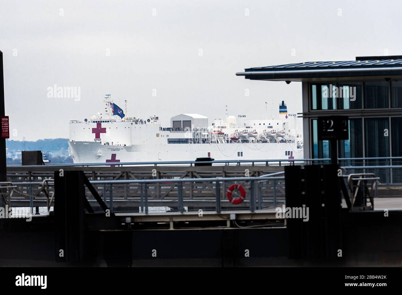 The U.S. Naval hospital ship Comfort is seen entering the Hudson River ...