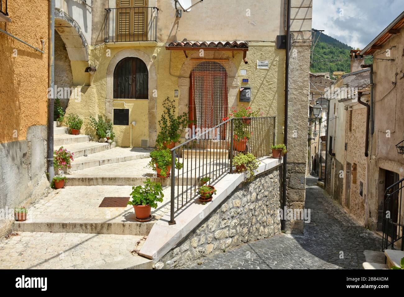 Pacentro, Italy. A narrow street between the old houses of a medieval ...