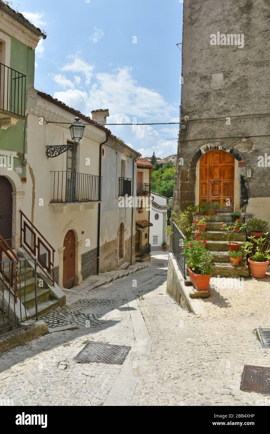 Pacentro, Italy. A narrow street between the old houses of a medieval ...