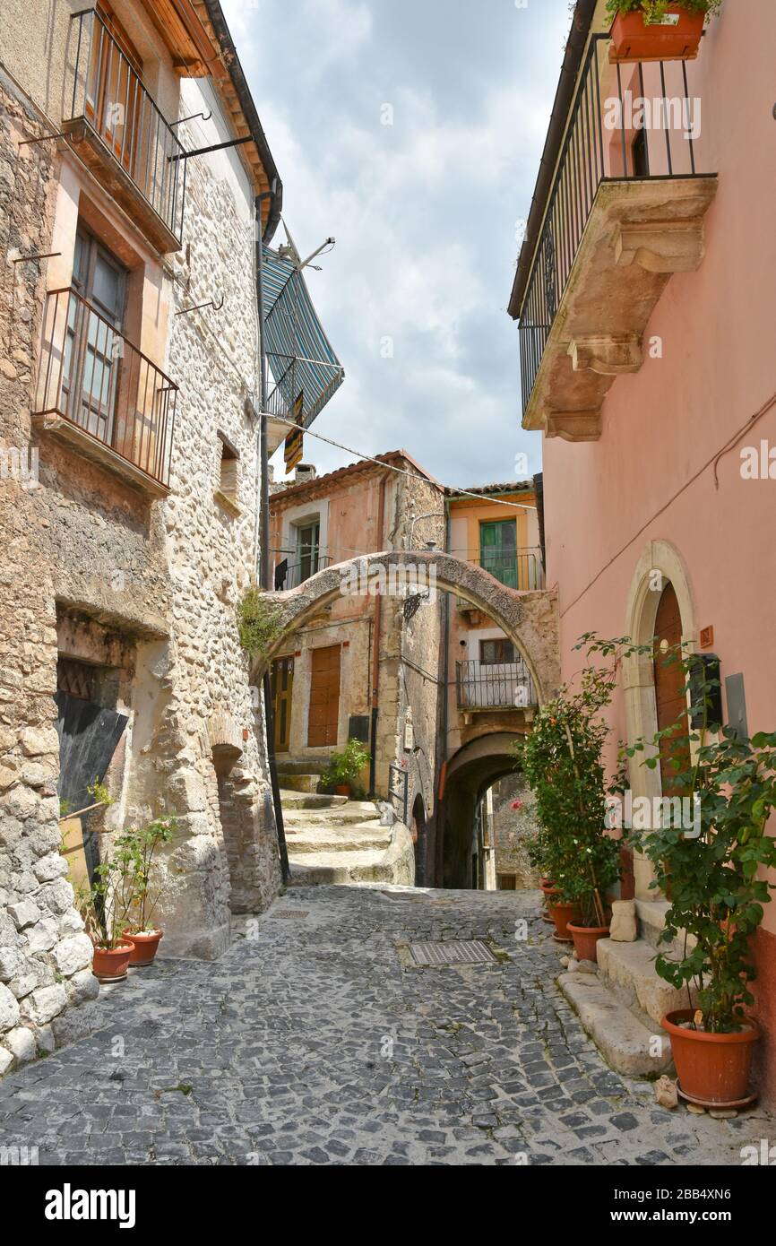 Pacentro, Italy. A narrow street between the old houses of a medieval ...