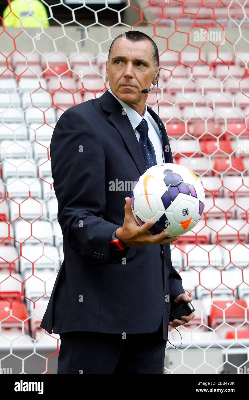 Referee Neil Swarbrick testing the 'Hawkeye' goal line technology Stock ...