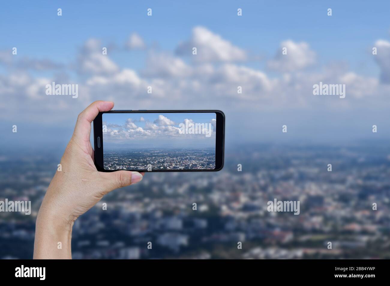 Hand holding phone landscape hi-res stock photography and images - Alamy