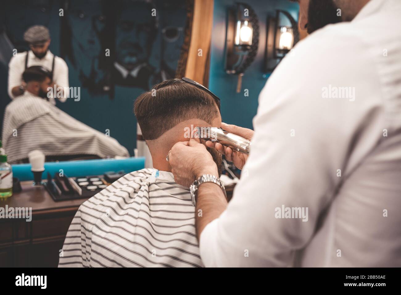 Male barber salon cuts client hi-res stock photography and images - Alamy