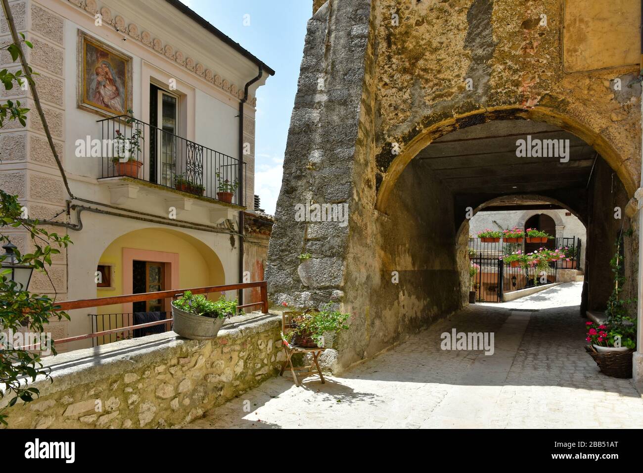 Pacentro, Italy. A narrow street between the old houses of a medieval ...
