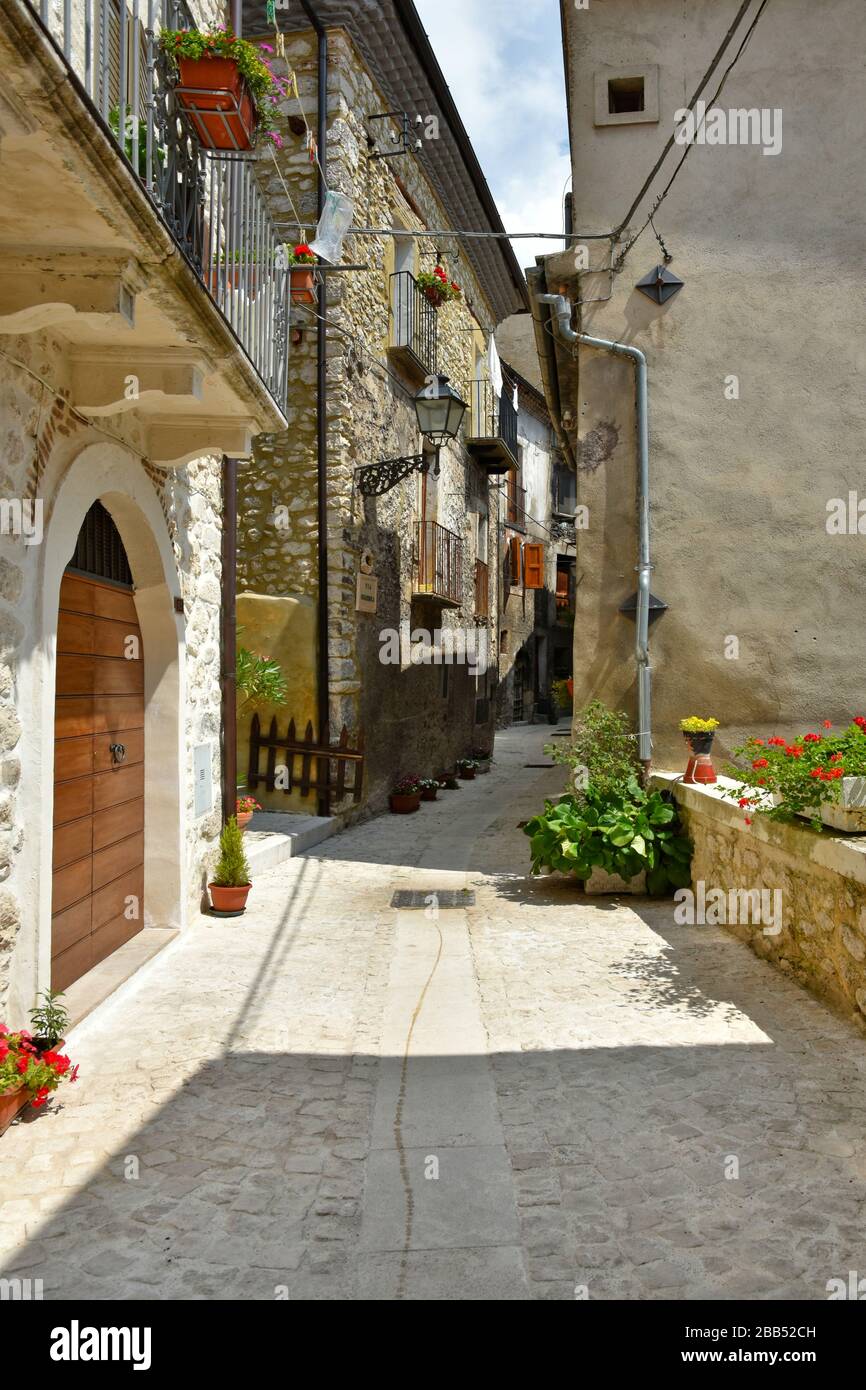 Pacentro, Italy. A narrow street between the old houses of a medieval ...