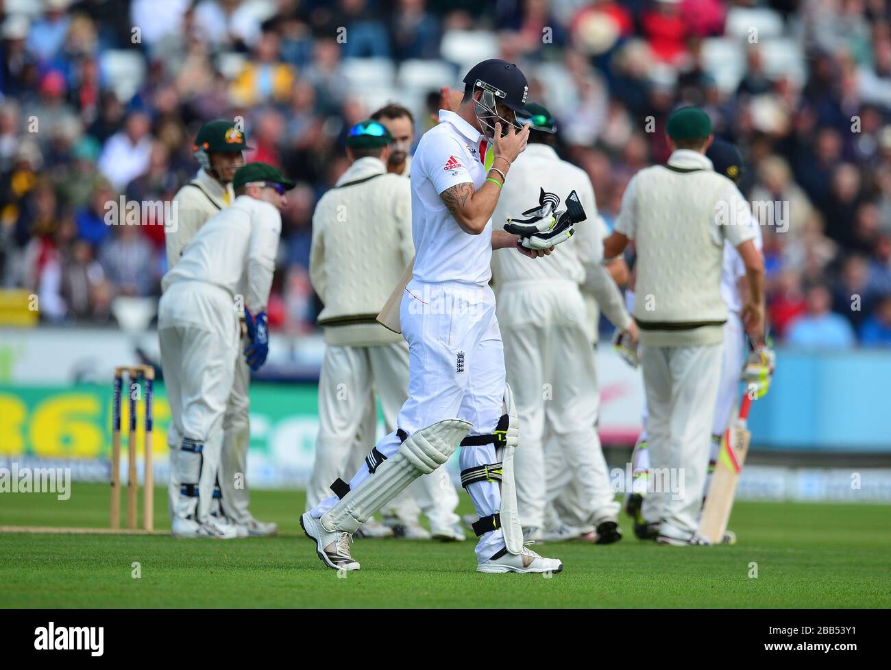 England's Kevin Pietersen walks of after being caught out by Australia ...