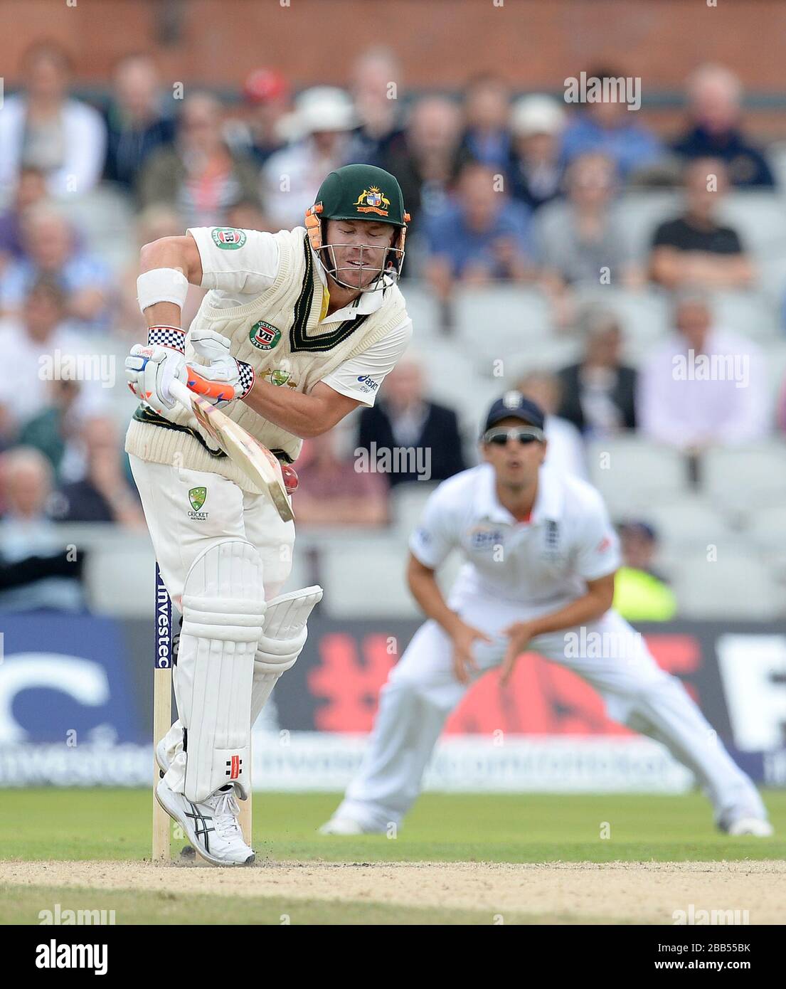 Australia's David Warner is hit by a delivery from England's Stuart ...