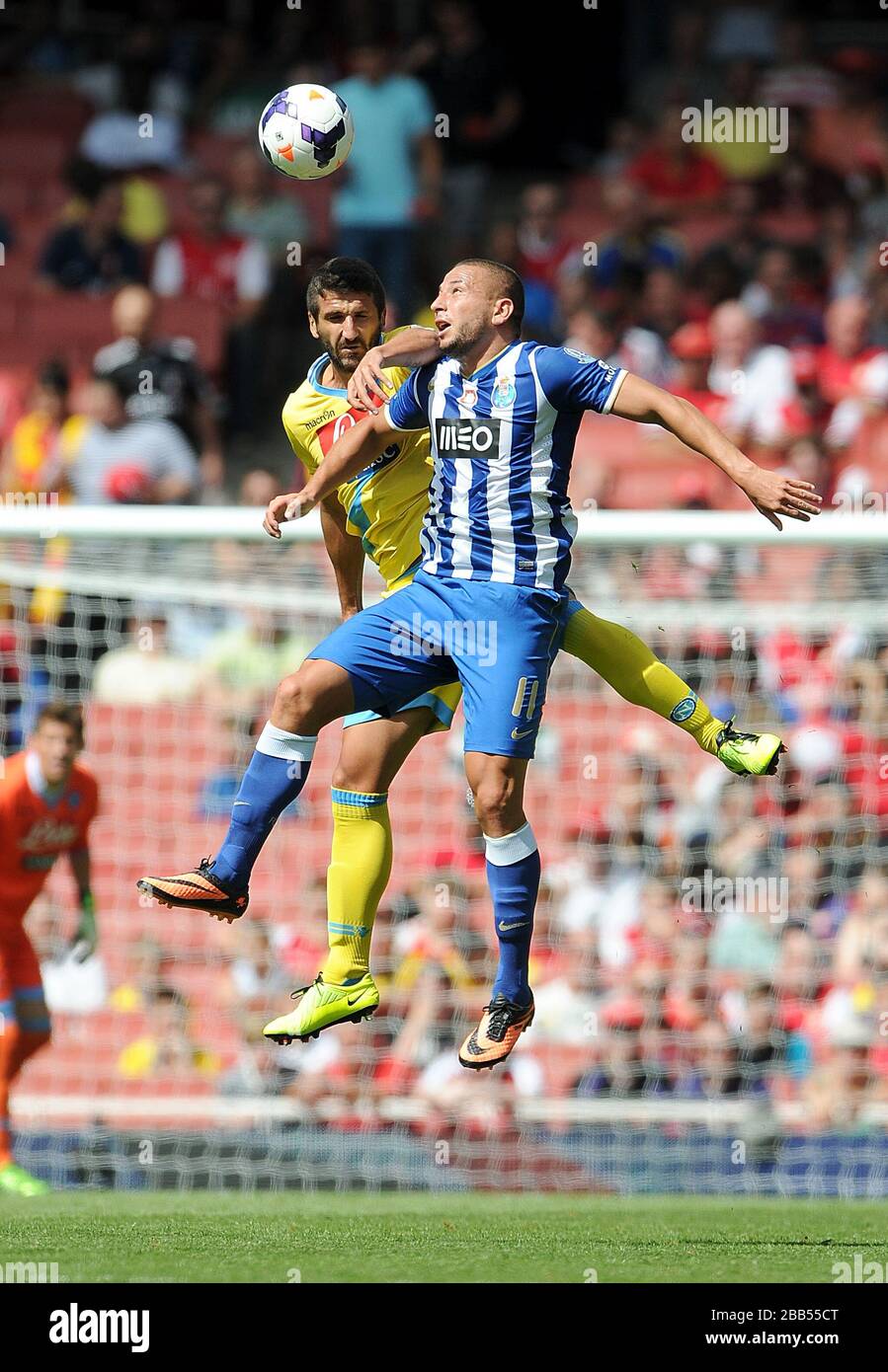 Napoli's Alessandro Gamberini (rear) and FC Porto's Nabil Ghilas battle ...