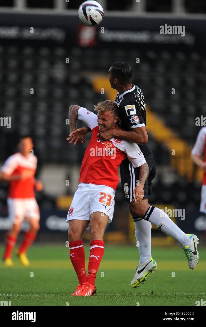 Notts County's Dean Leacock (right) wins a header against Fleetwood ...