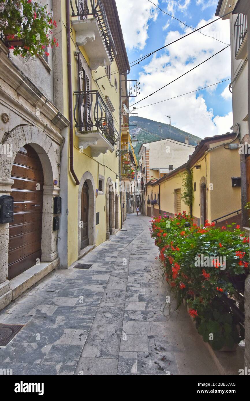 Pacentro, Italy. A narrow street between the old houses of a medieval ...