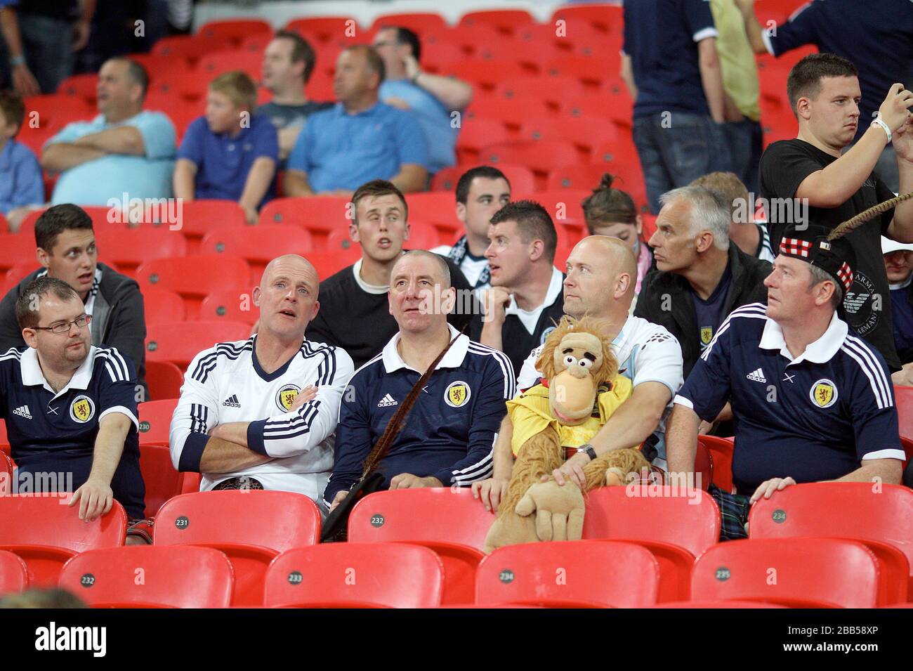 Dejected scotland fans in the stands after the final whistle hi-res ...