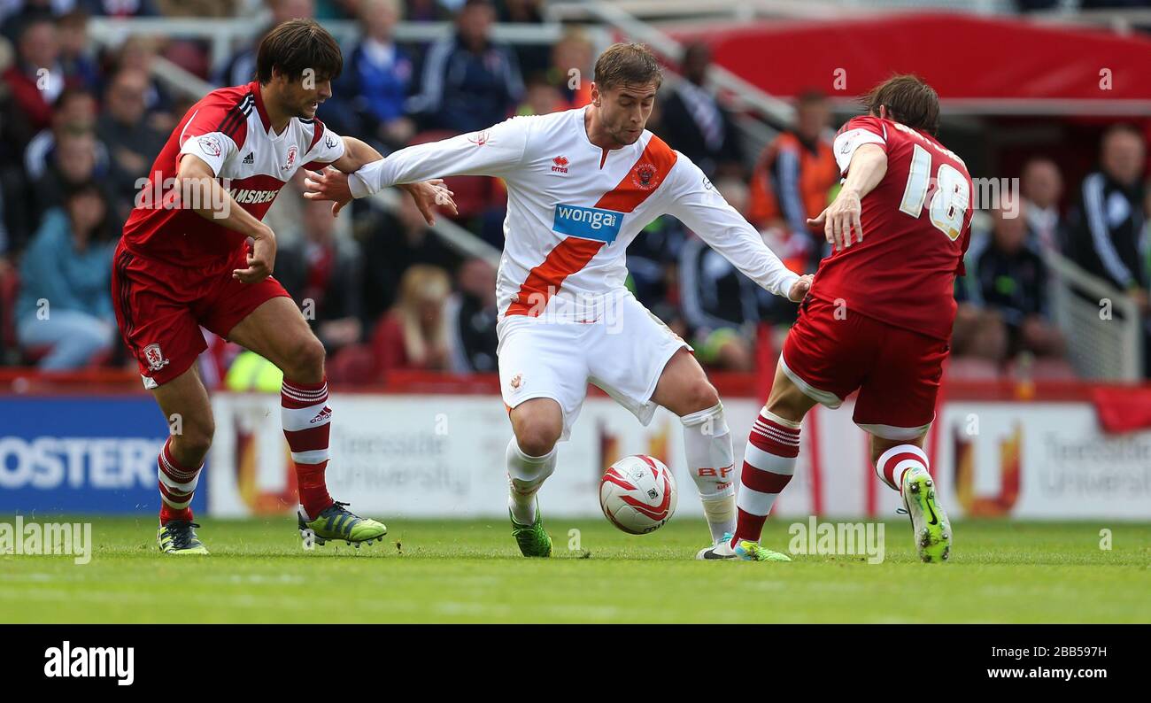 Blackpool's Angel Martinez and Middlesbrough's Rhys Williams and Dean ...