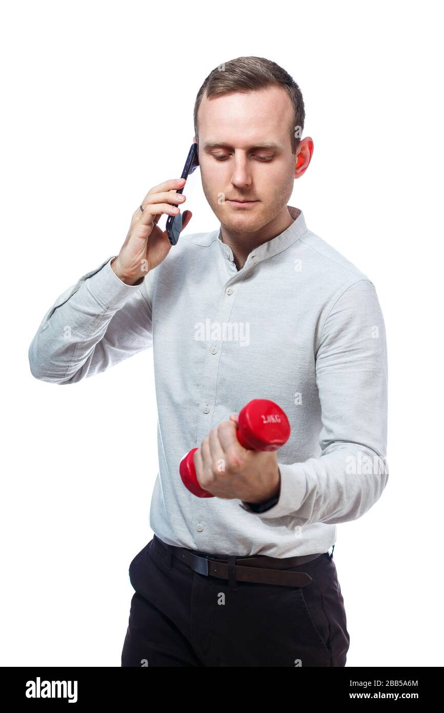 man businessman, teacher talking on the phone and playing sports holds ...