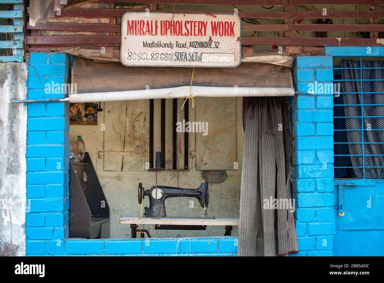 Front of a tailor's shop Stock Photo - Alamy