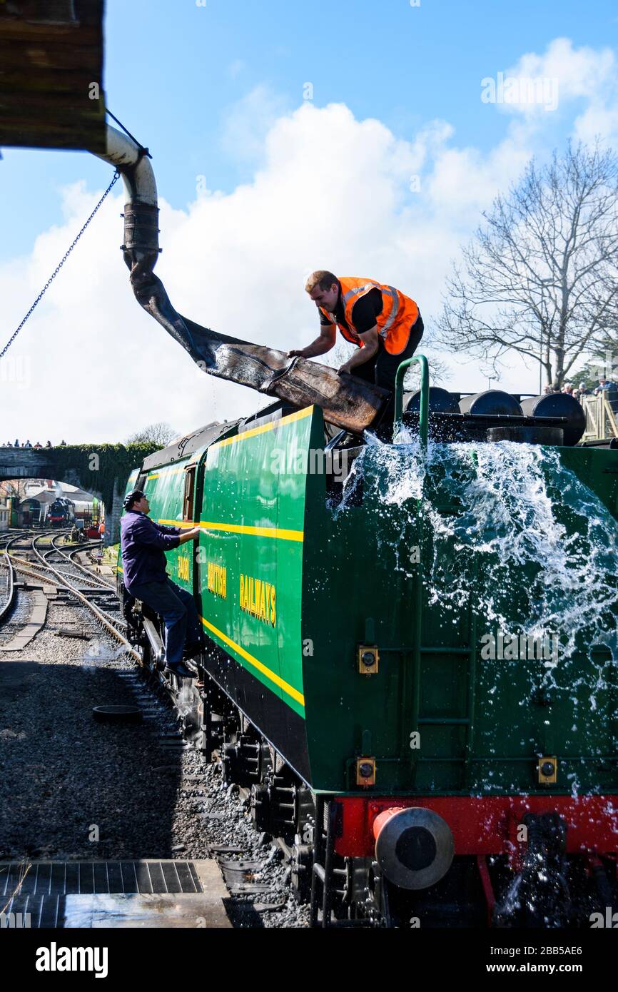 Water spills over from the tender of Battle of Britain Class Steam Loco ...