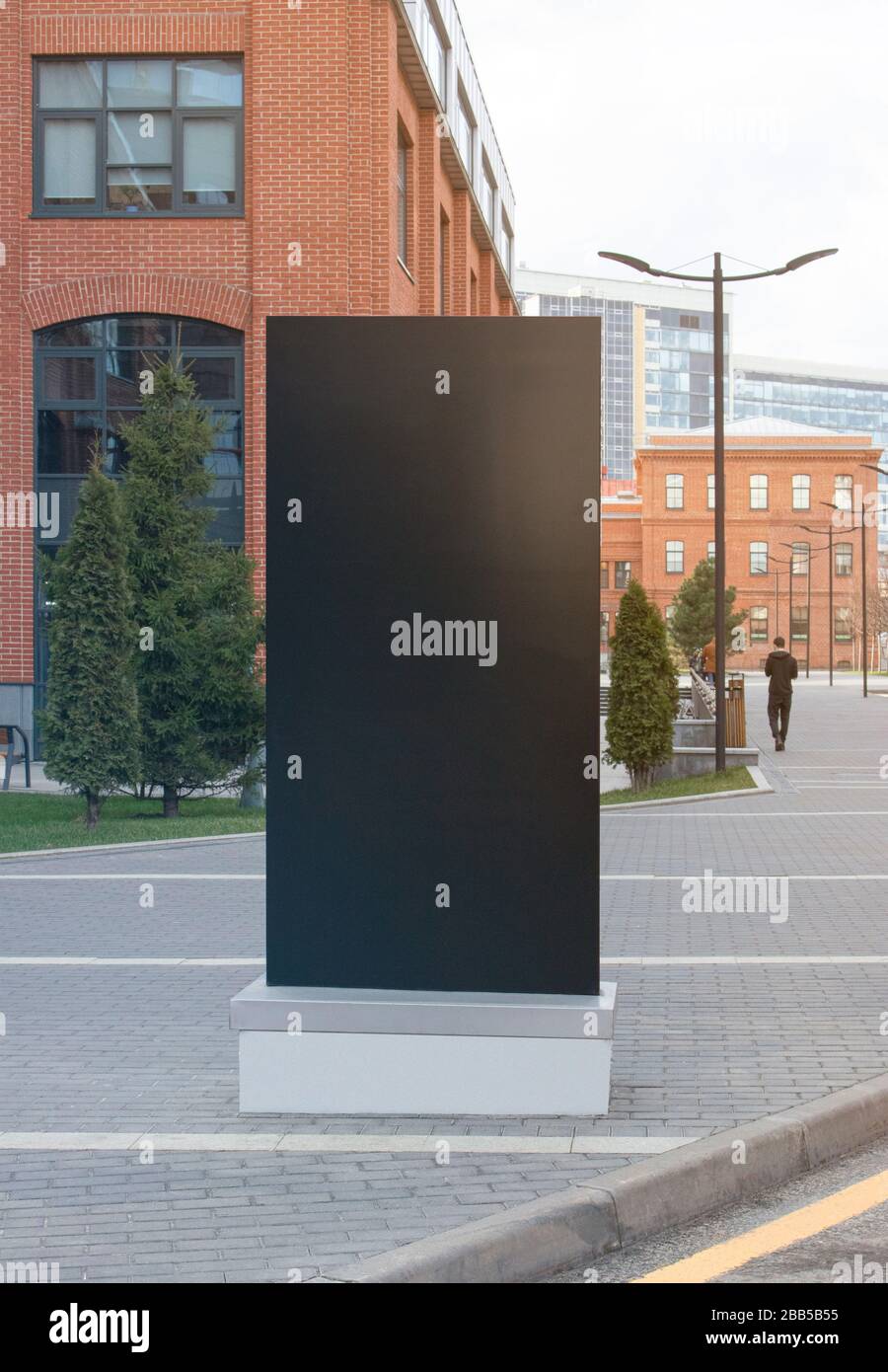 Blank black vertical pylon stand mockup brick building background Stock ...