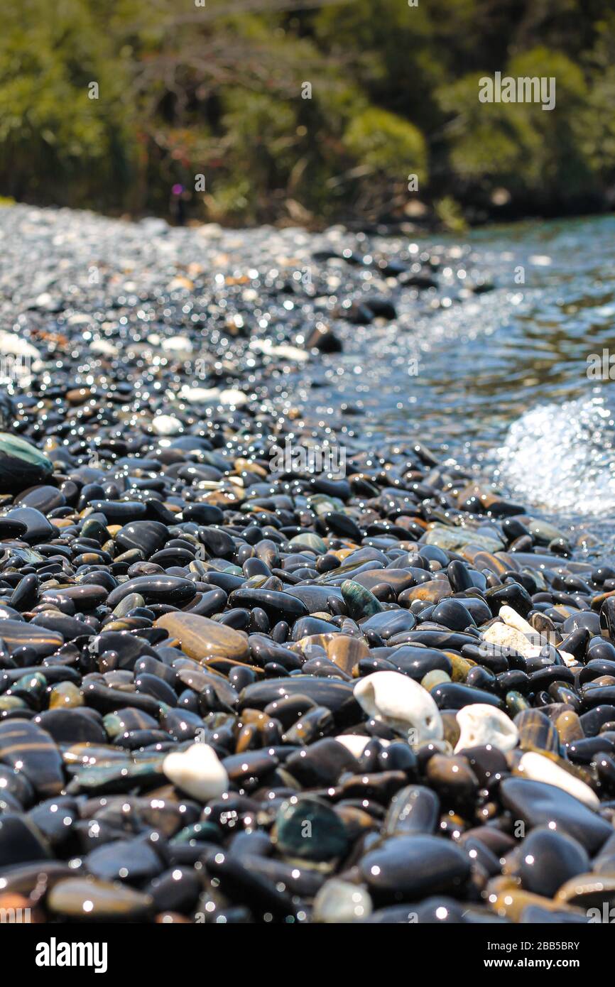 Curved beach and rocks hi-res stock photography and images - Alamy