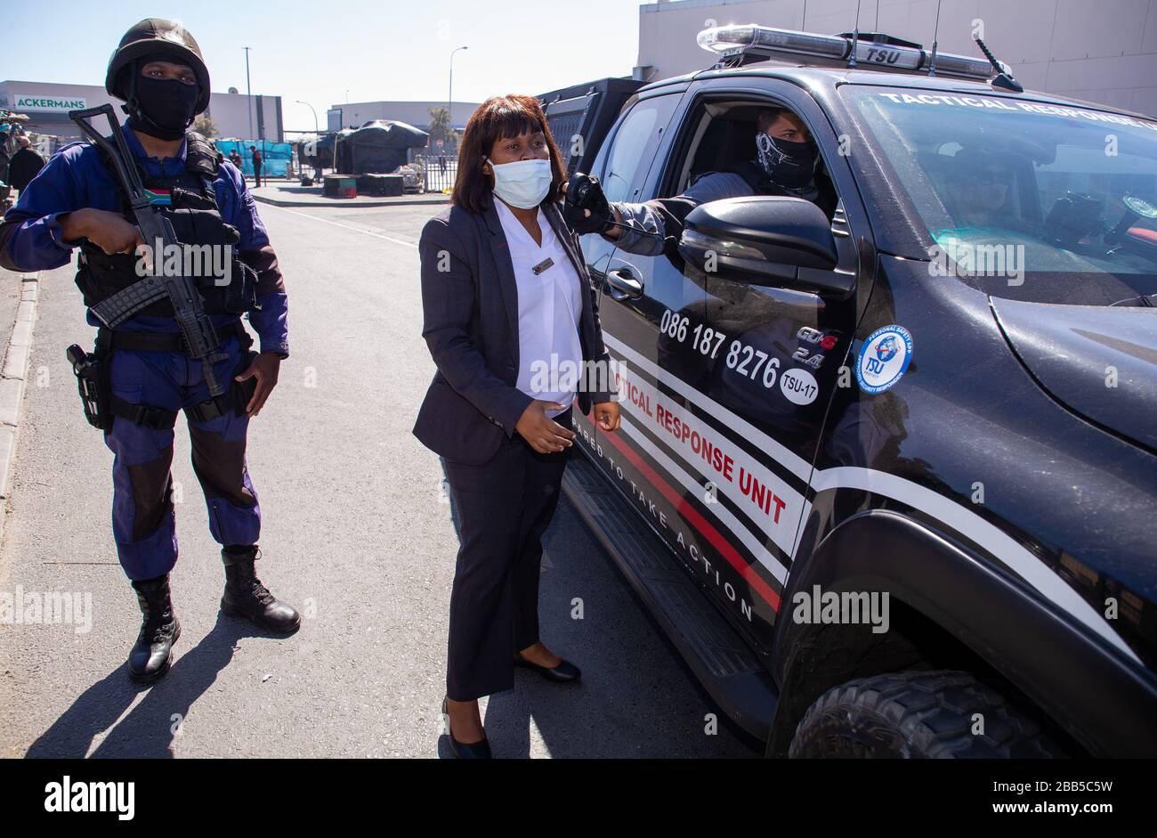 Cape Town, South Africa. 30th Mar, 2020. a staff member from Capitec ...