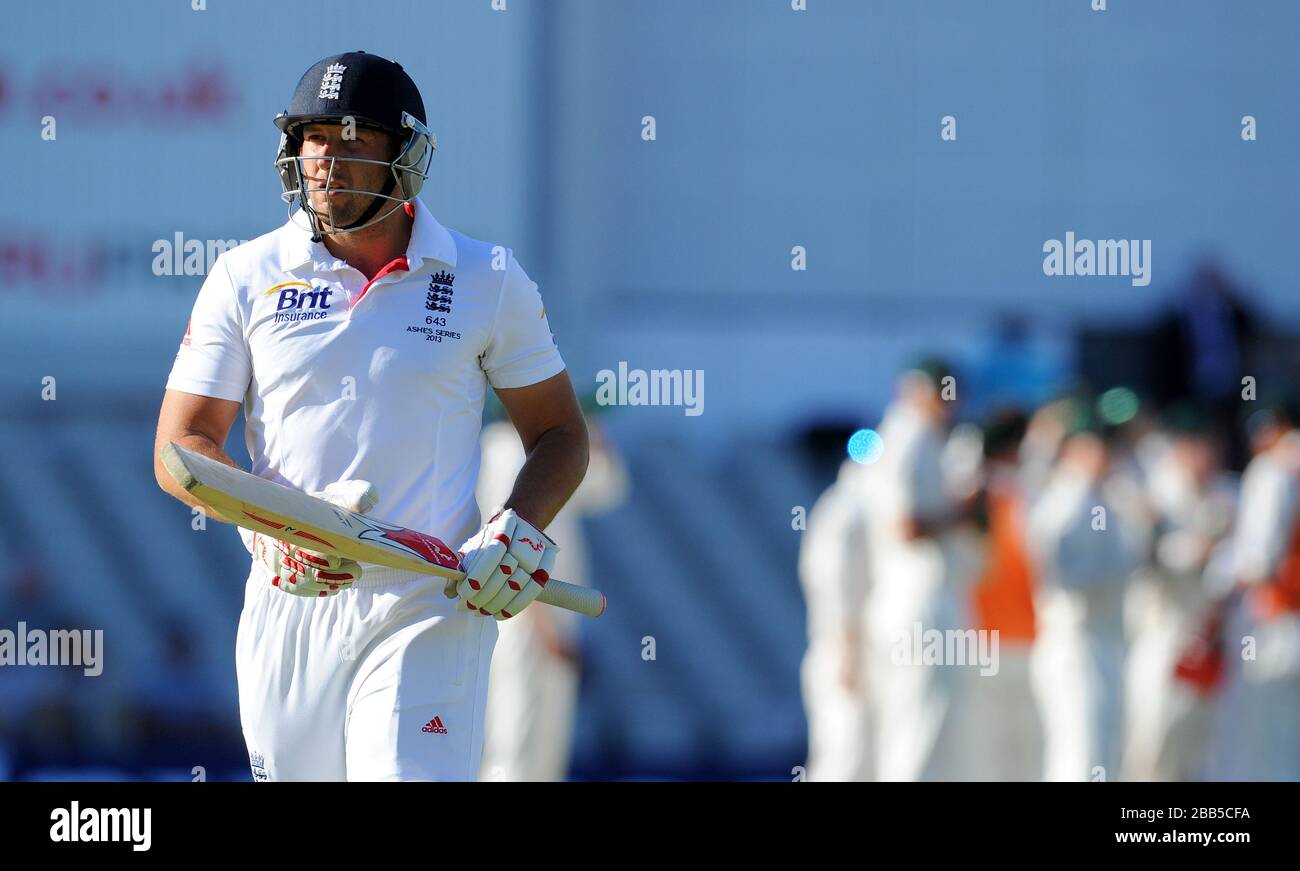 England's Tim Bresnan leaves the pitch after being caught Australia's ...
