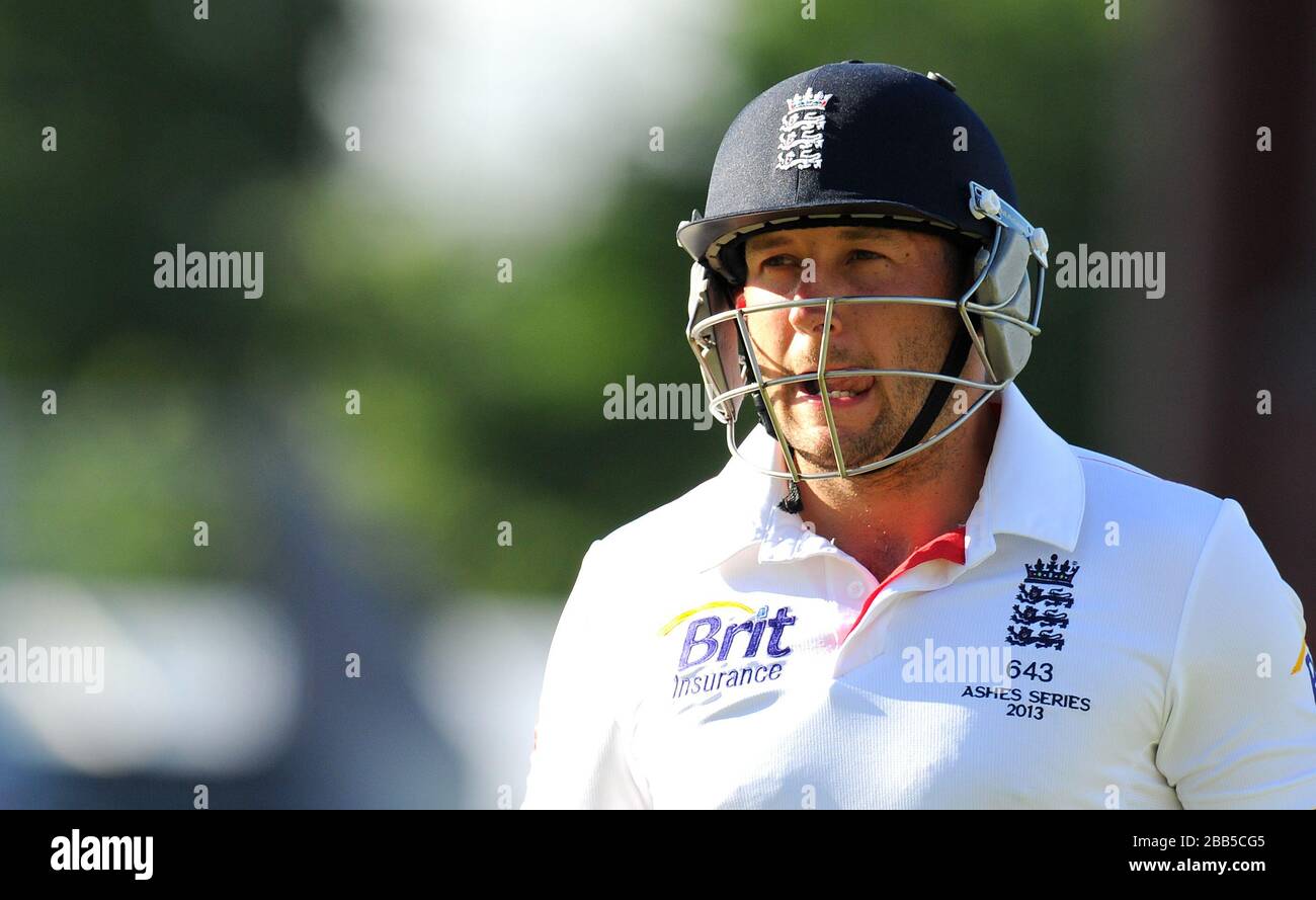 England's Tim Bresnan leaves the pitch after being caught Australia's ...