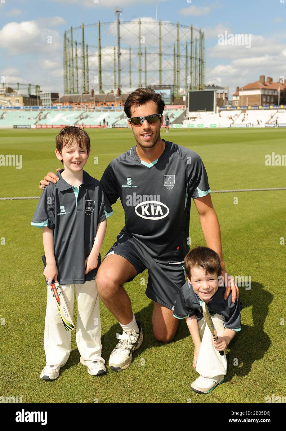 Surrey's Tom Jewell with the match day mascots Stock Photo - Alamy