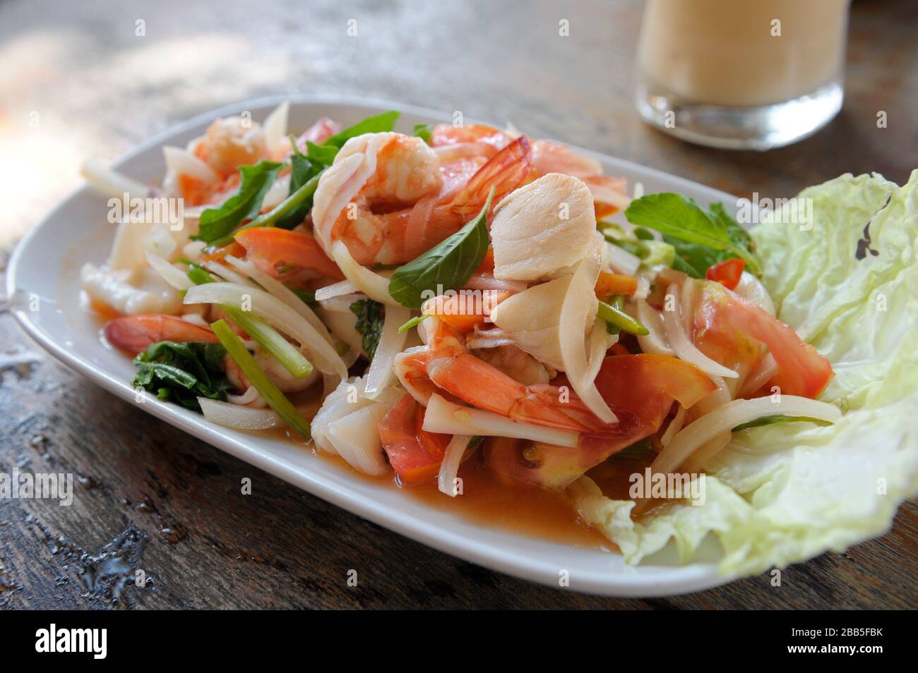 Thai food, plate decorated with flower with two forks Stock Photo - Alamy