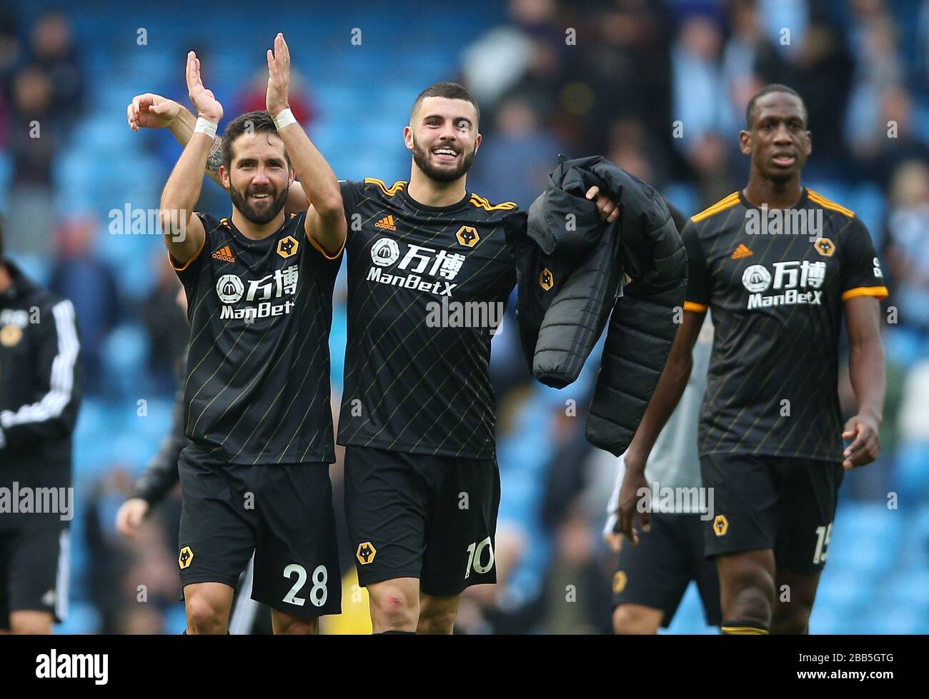 Wolverhampton Wanderers' Joao Moutinho (left) and Patrick Cutrone ...